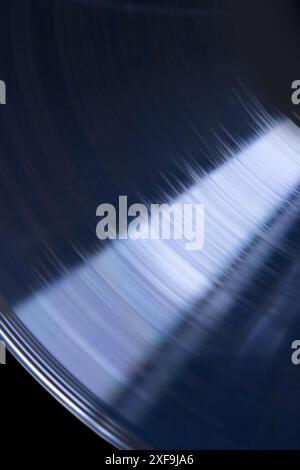 Rotation LP vinyl records and vintage adapter Stock Photo - Alamy