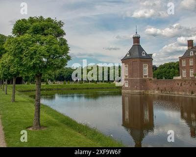 water castle with trees and reflections in water Stock Photo - Alamy