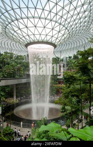 Interior of Jewel Changi shopping mall in Singapore, illuminated by ...