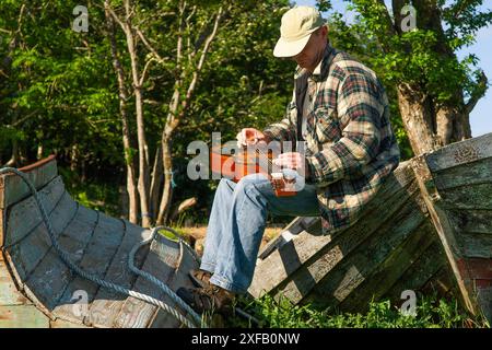 Robin Clark owner of Busker Guitars plays one of Busker guitars ...