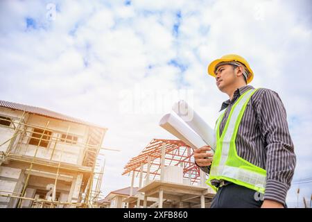 Asian business man construction engineer worker in protective helmet ...