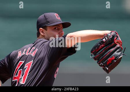Cleveland Guardians starting pitcher Logan Allen delivers against the ...