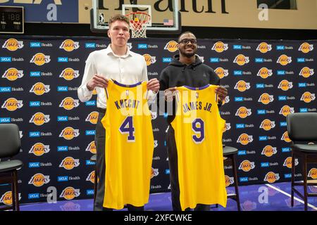 Los Angeles Lakers guard Bronny James, left, and forward LeBron James warm up before an NBA ...