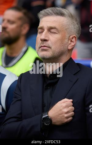 Romania's head coach Edward Iordanescu gestures at the end of a round ...