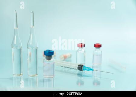 Ampoules containing liquid vaccine or medication for pharmaceutical ...