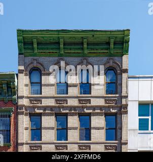 NYC Chinatown: 26 East Broadway is a six-story beige roman brick and ...