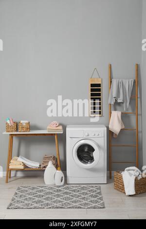 Washing machine, ladder, detergents, basket, laundry and storage bench ...