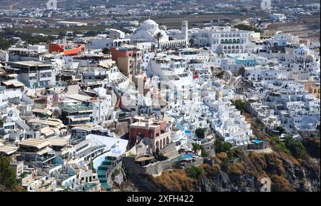 Panoramic view capital Fira perched precariously overlooking caldera ...
