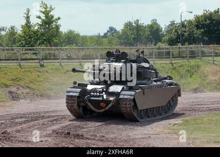 A Dutch Army Centurion Mk 3 (20-Pounder) tank driving around the arena ...