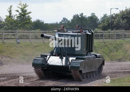A Centurion FV4005 prototype tank driving around the arena at the ...