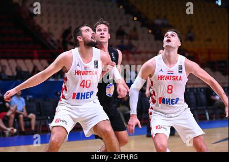40 Ivica Zubac of Croatia competing with 9 Josh Nebo of Slovenia during ...