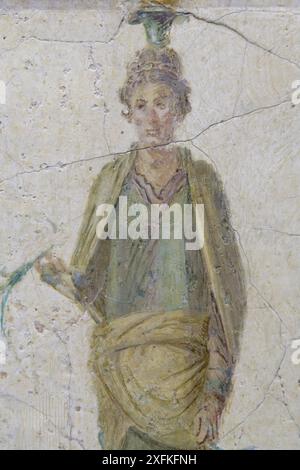 Ancient Roman Wall painting with garlands and objects related to ...