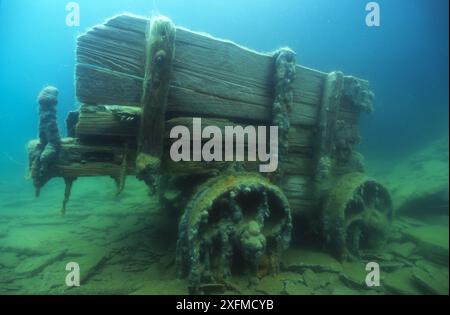 Mine cart in flooded slate quarry on Belnahua island. Scotland. 1996 ...