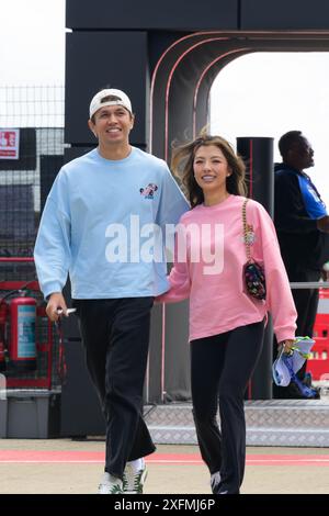 Alexander Albon of Williams with girlfriend Lily Muni He during the ...