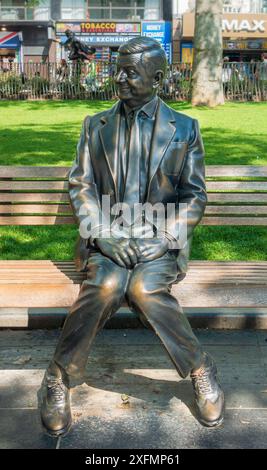 Mr Bean statue in Leicester Square with face covering Stock Photo - Alamy