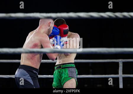 Fierce boxing match showcases athletes' power and skill Stock Photo - Alamy