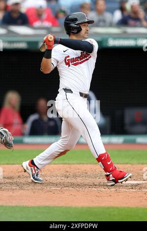 Cleveland Guardians' Steven Kwan hits a single during the first inning ...