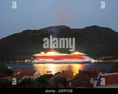 Cruise ship leaving from Kotor bay Boka Kotorska, Montenegro., motion ...