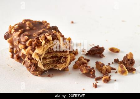 Sweet bar made from wafer covered with caramel and chocolate icing ...