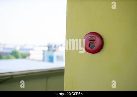 Fire bell pull sign in supermarket Stock Photo - Alamy