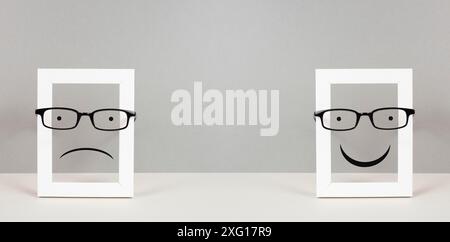 Frame with a sad face, mental health concept, negative mindset ...