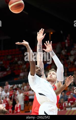 Eric Gordon from Bahamas team, AJ Slaughter from Poland team seen in ...
