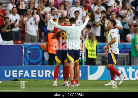 Stuttgart. 5th July, 2024. Players of Spain celebrate after Daniel Olmo ...