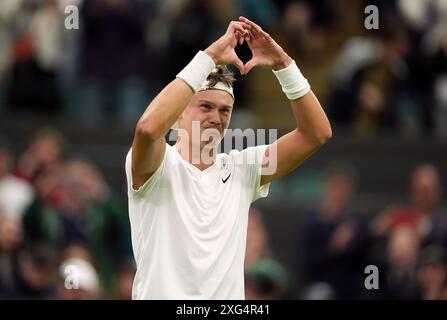 Holger Rune celebrates beating Quentin Halys (not pictured) on day six ...