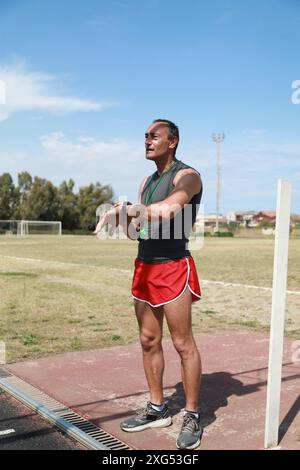 Coach Checking Time On His Smartwatch Stock Photo - Alamy