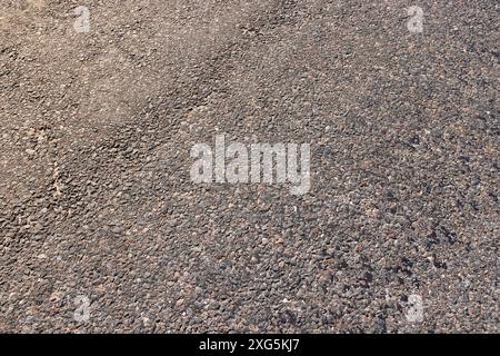details asphalting of a road , a part of a highway covered with asphalt ...