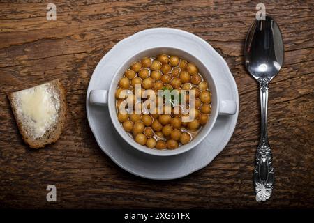 Bavarian pea soup on wood Stock Photo - Alamy