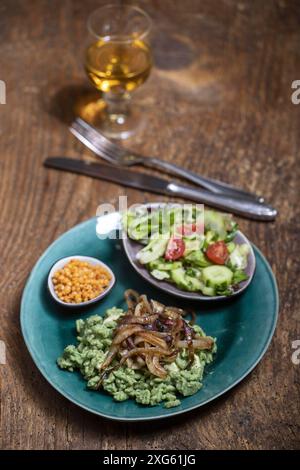 Bavarian spinach spaetzle on wood Stock Photo - Alamy