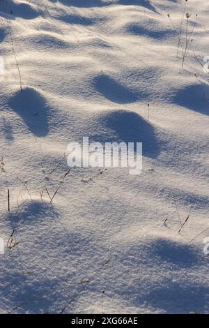drifts of white pure snow after a snowfall, beautiful white snow in the ...