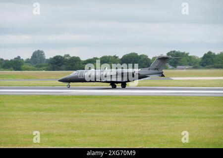 Learjet 75 preparing for take off at Manchester Airport Stock Photo - Alamy
