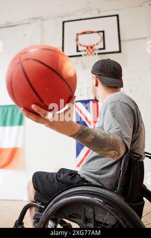 Young Male Wheelchair Athlete Training on Outdoor Track at Sunset for ...