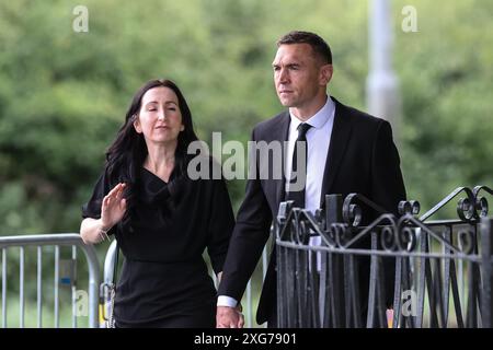Kevin Sinfield his wife Jayne Sinfield arrive during Rob CBE Burrow ...
