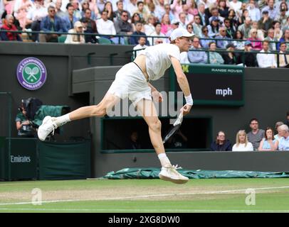 Italy's Jannik Sinner serves against during the singles tennis match of ...