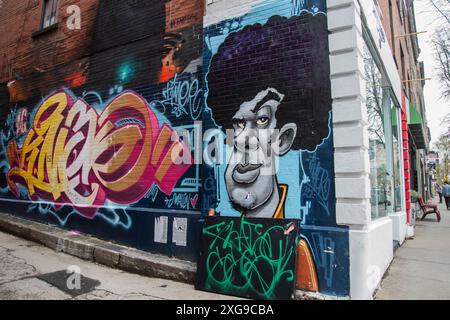 Black cartoon character mural in an alley near Saint-Laurent Boulevard ...