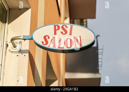 Illuminated sign with the inscription Psi Salon (pet hairdresser) in ...