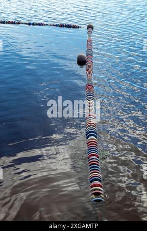 floating barrier line on shallow lake beach Stock Photo - Alamy