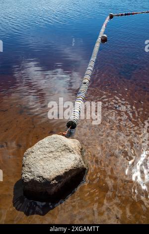 floating barrier line on shallow lake beach Stock Photo - Alamy