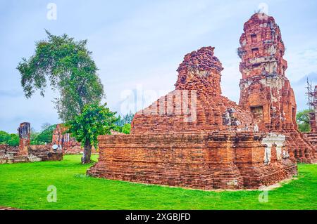 The ruins of ancient brick shrines and chedis of Wat Mahathat complex ...