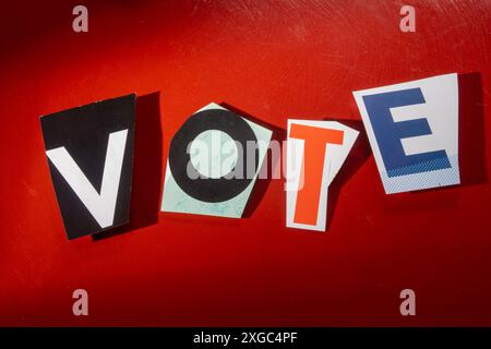 The Word "VOTE" using cut-out paper letters in the ransom note effect ...