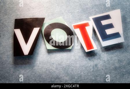 The Word "VOTE" using cut-out paper letters in the ransom note effect ...