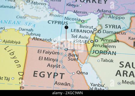 black pin needle into cairo city of egypt political map Stock Photo - Alamy