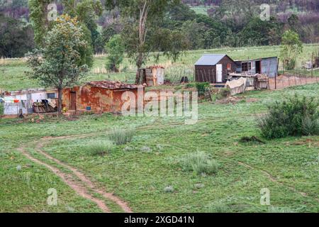 shacks made out of tin corrugated sheet metal in an informal settlement ...