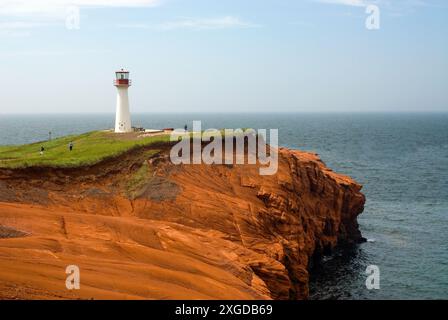 Lighthouse on the sandstone cliffs of Etang-du-Nord cape, Cap aux ...