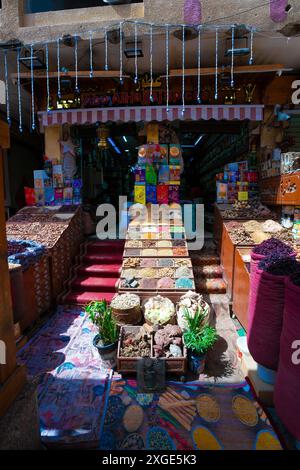 Spices and various nuts beckon shoppers in the Aswan, Egypt bazaar ...