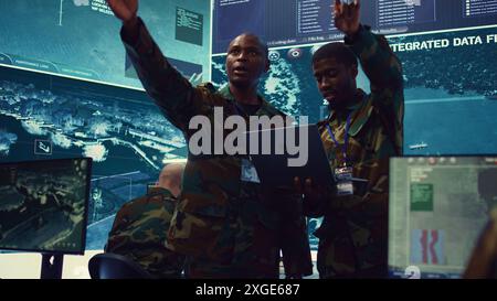 Army commanders overseeing field operations with real time data ...