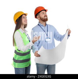 Engineers in hard hats with draft on white background Stock Photo - Alamy